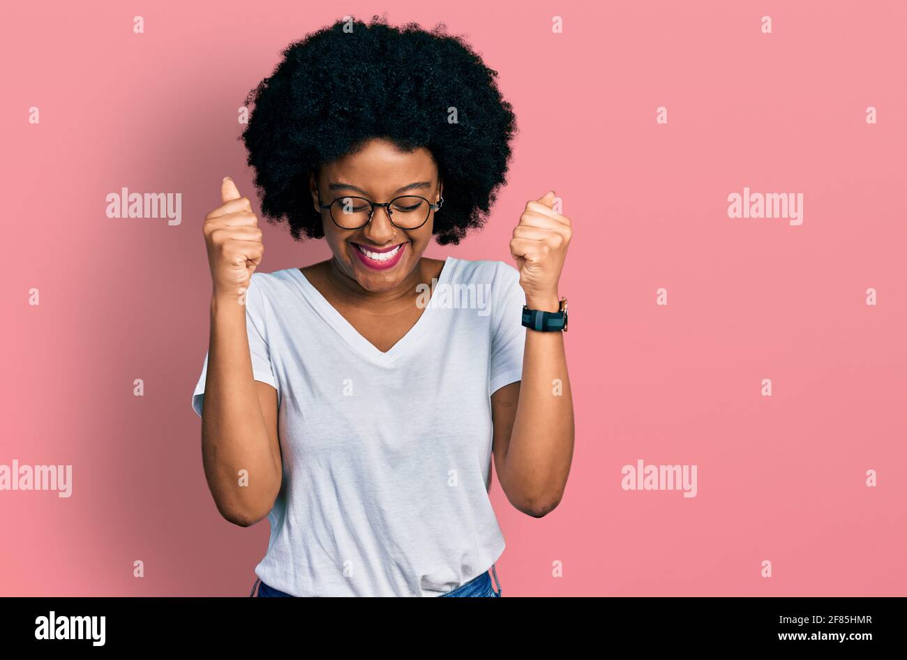 Young african american woman wearing casual white t shirt excited for ...