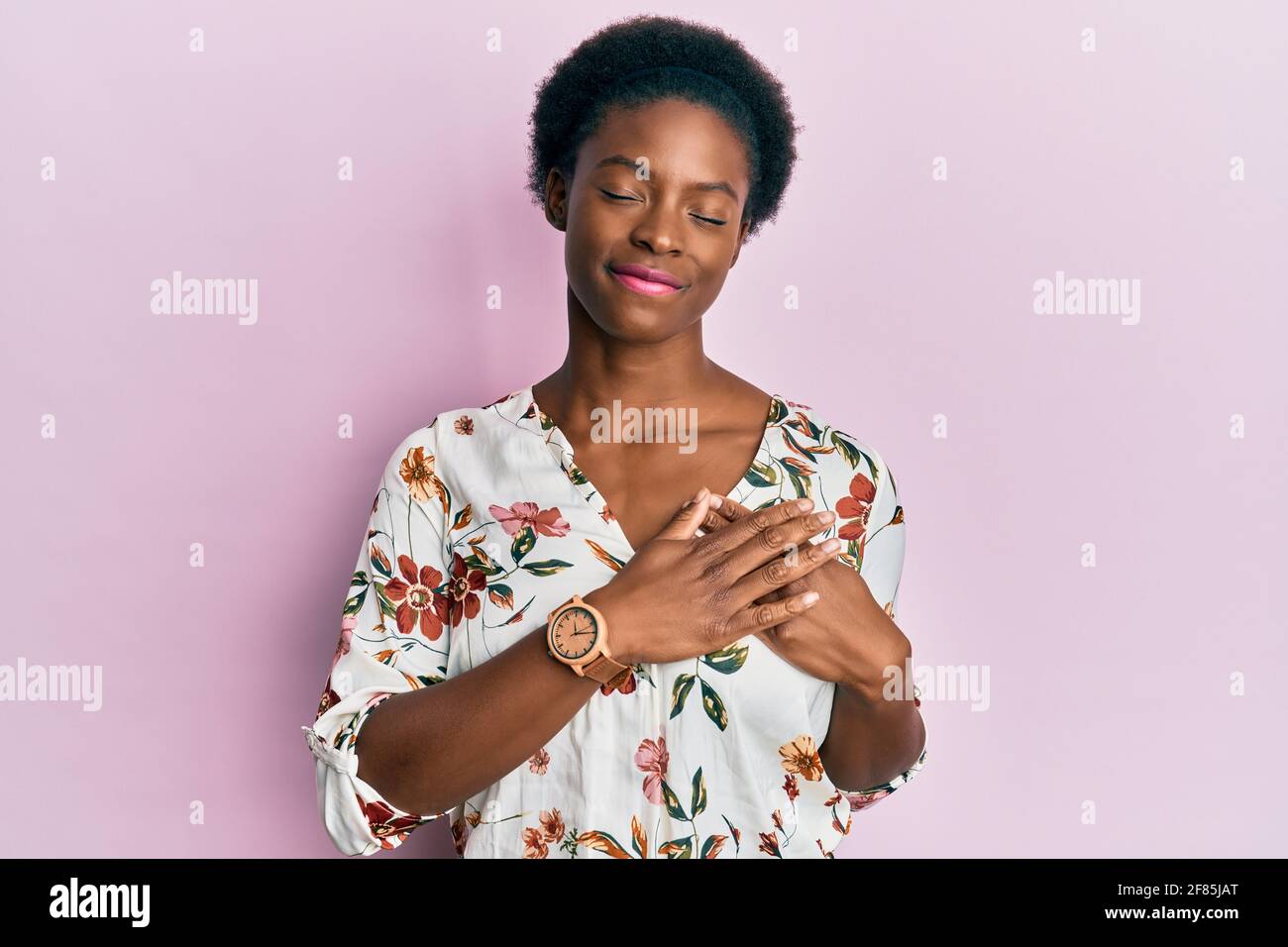 Young african american girl wearing casual clothes smiling with hands ...