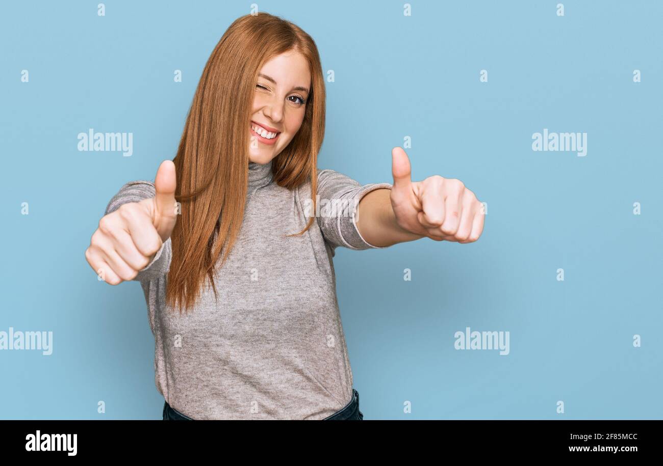 Young irish woman wearing casual clothes approving doing positive ...