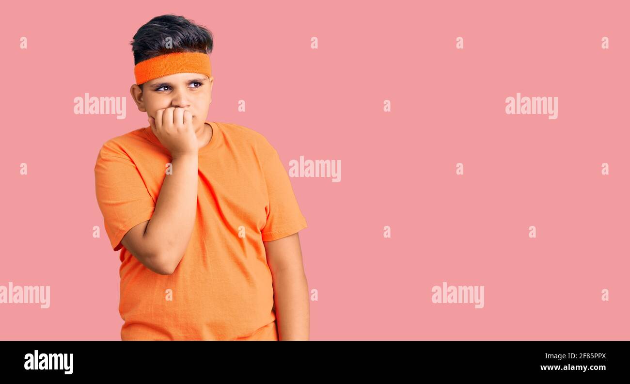 Little boy kid wearing sportswear looking stressed and nervous with ...