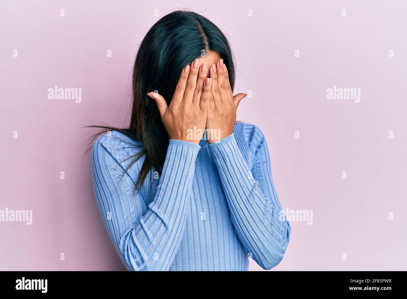 Young latin transsexual transgender woman wearing casual clothes with ...