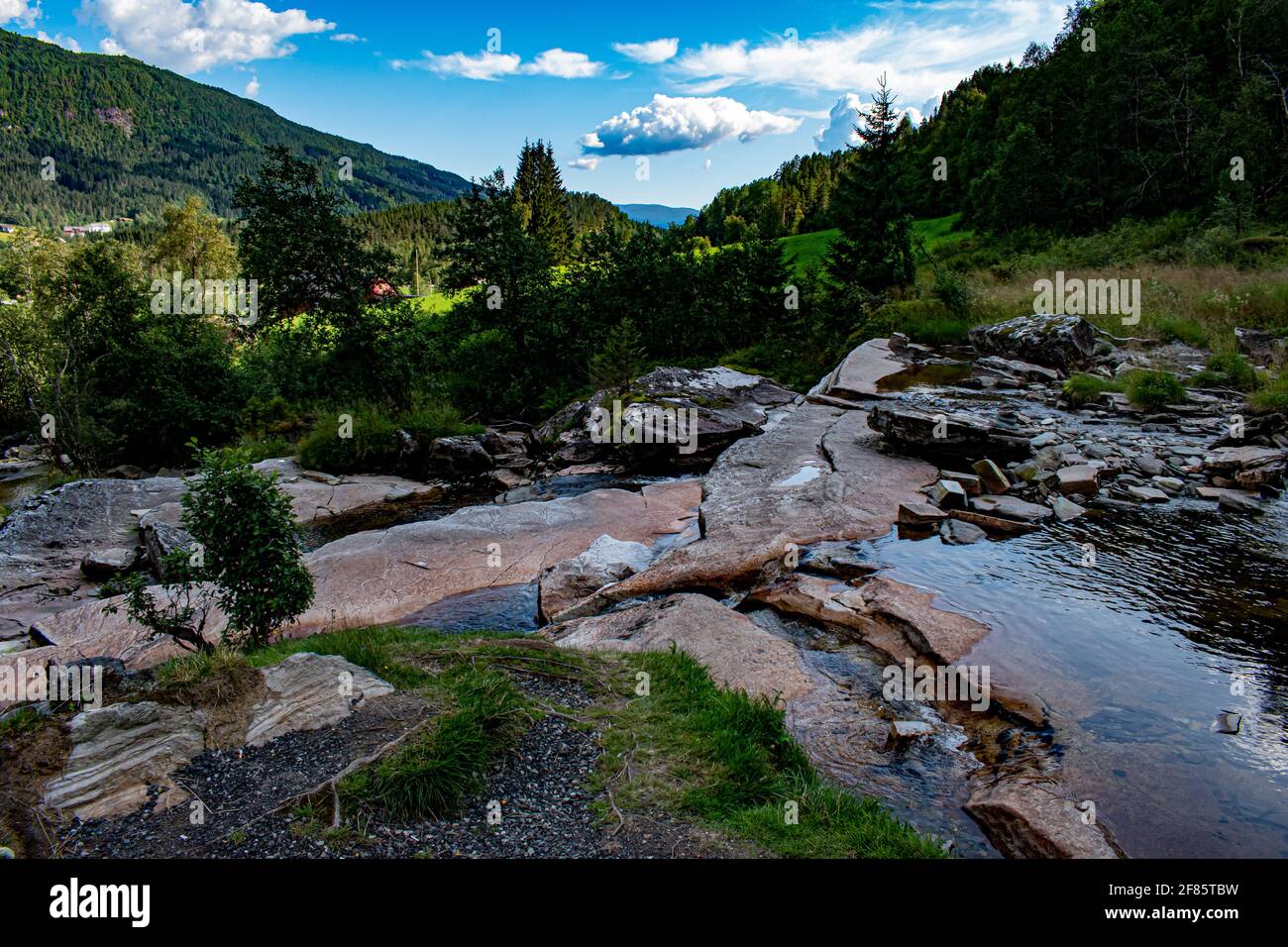 View into the valley from Tvindefossen waterfall area on Kroelvi river ...