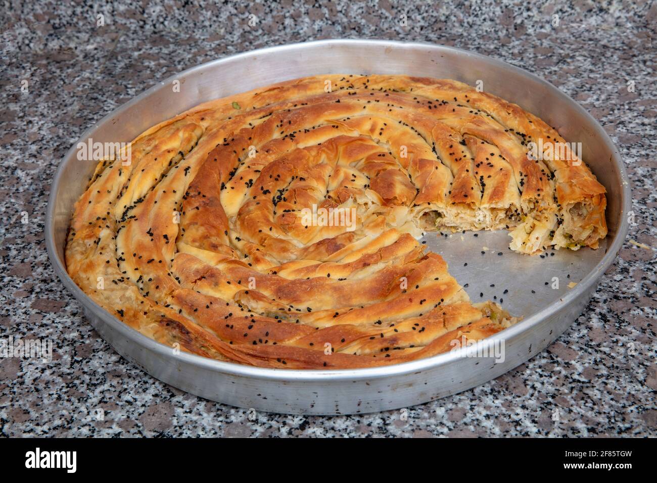 Bosnian borek. Homemade rolled borek, spinach, potato and feta cheese ...