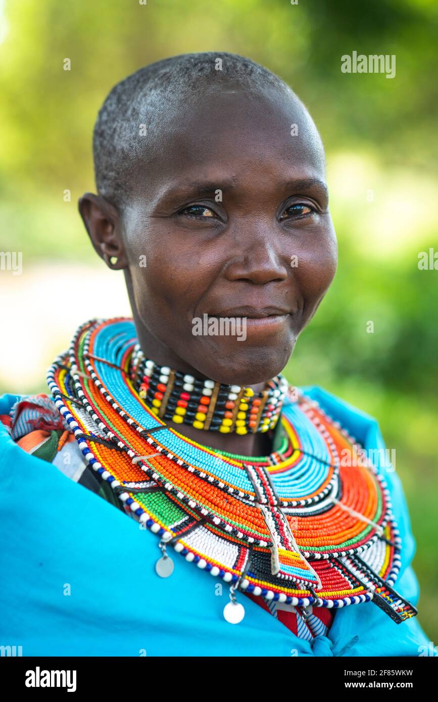 traditional African Maasai woman wearing beaded necklace and colorful ...