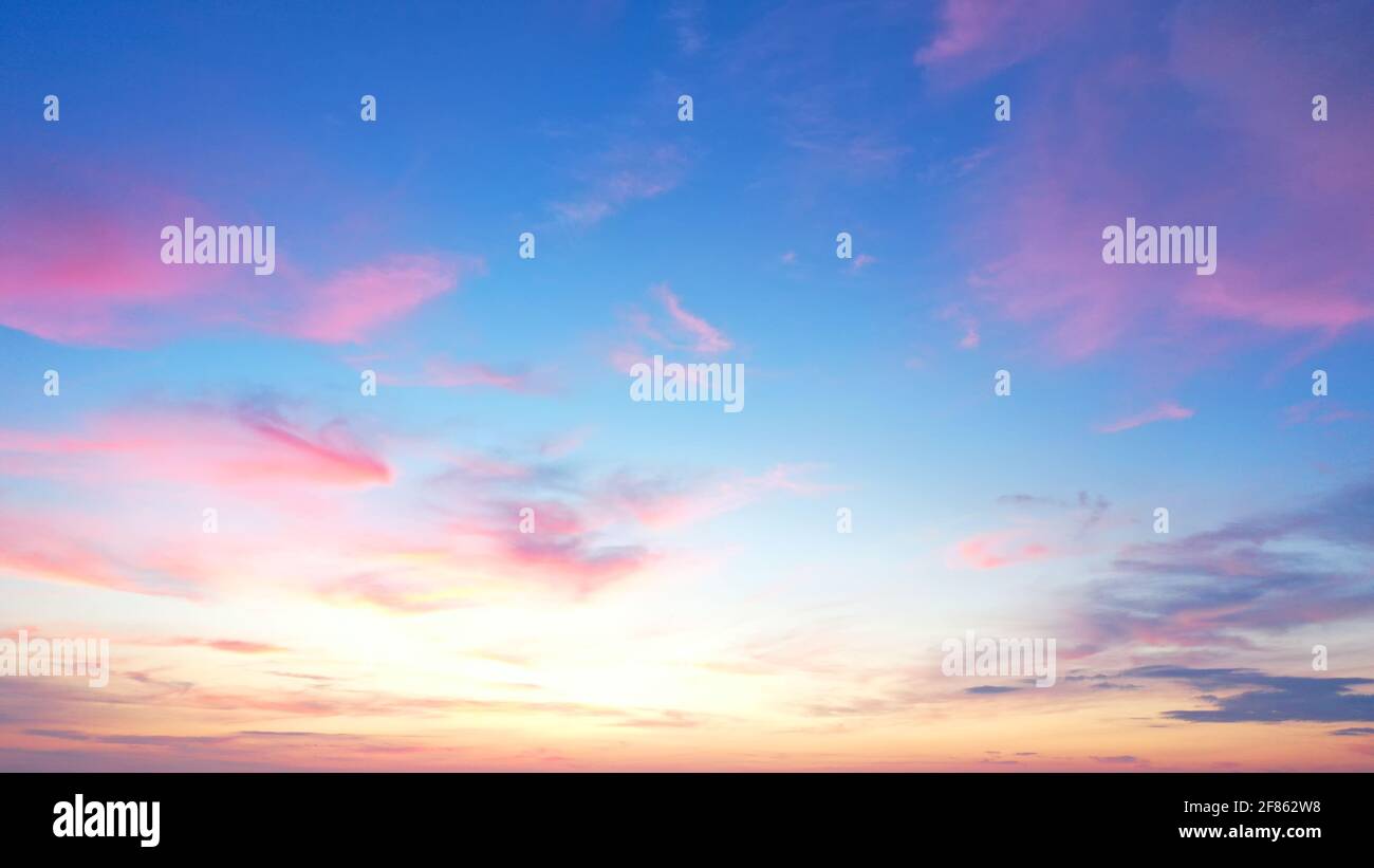 defaultBeautiful morning clear sky background. Colorful yellow blue sky ...
