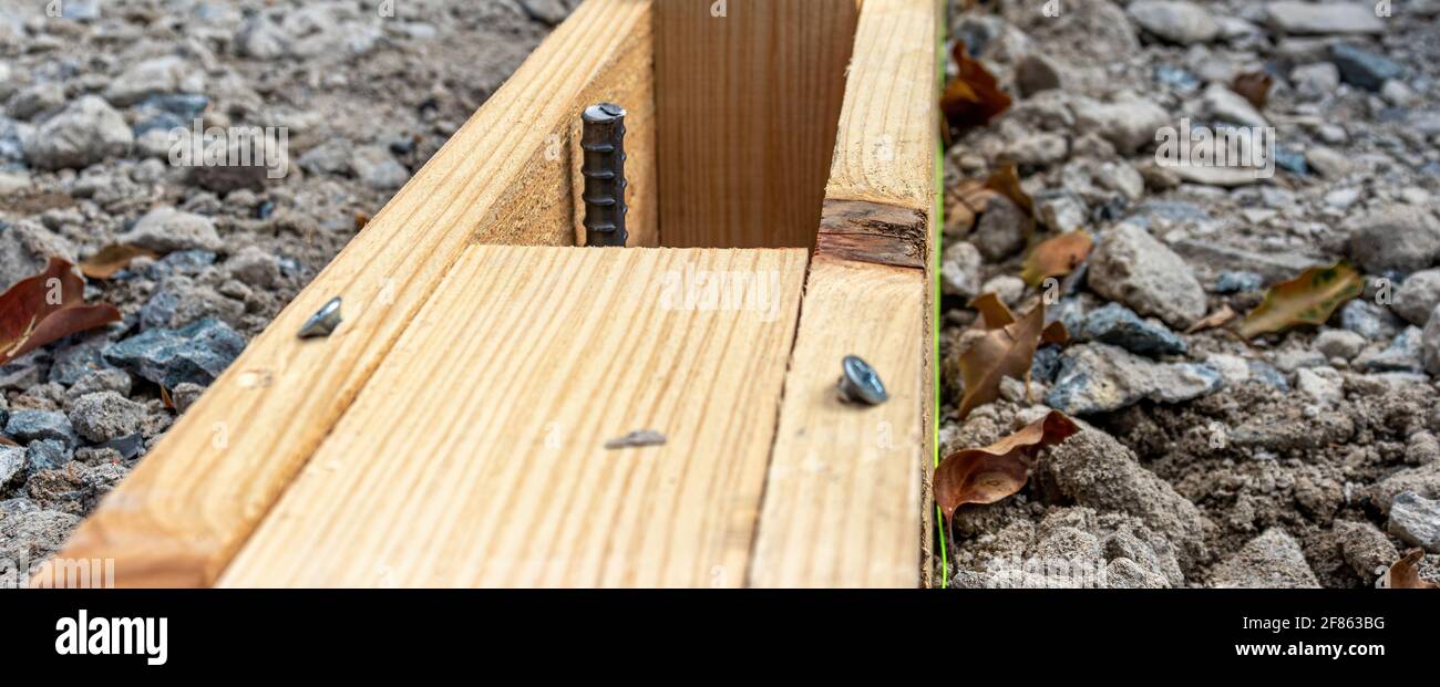 Planks have been screwed together, to form a framework where concrete ...