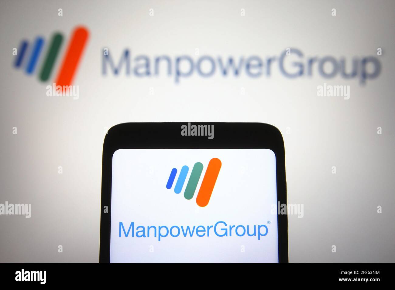 In this photo illustration the ManpowerGroup logo is seen on a ...