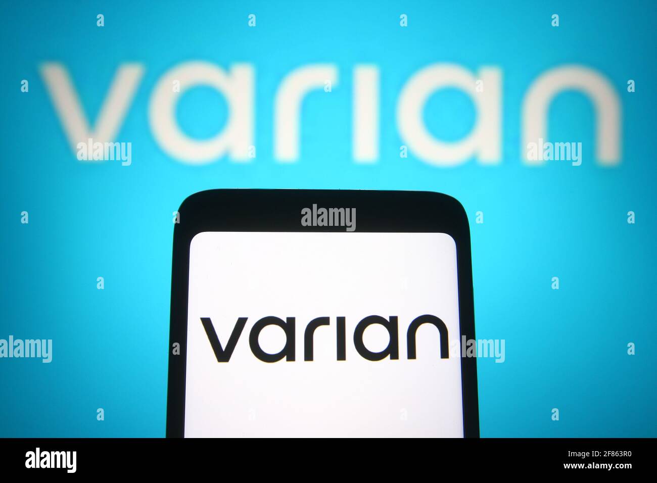 In this photo illustration a Varian Medical Systems (VAR) logo is seen ...