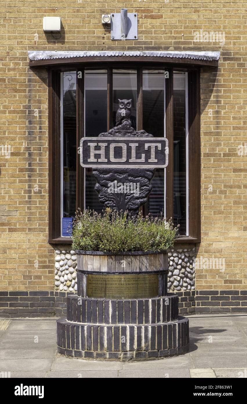 HOL, UNITED KINGDOM - Aug 07, 2018: The Holt town sign featuring an owl ...