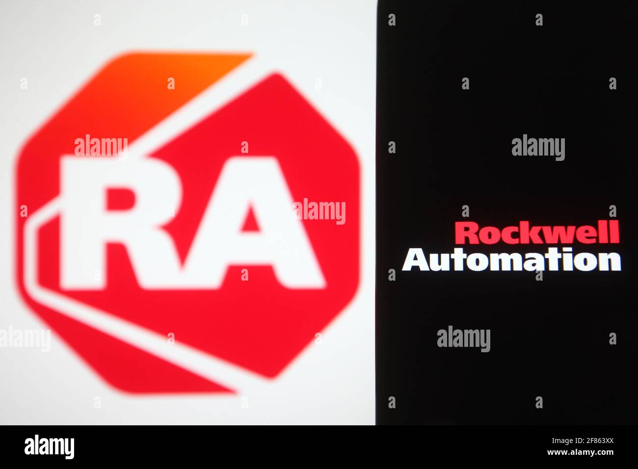 In this photo illustration a Rockwell Automation logo is seen on a ...