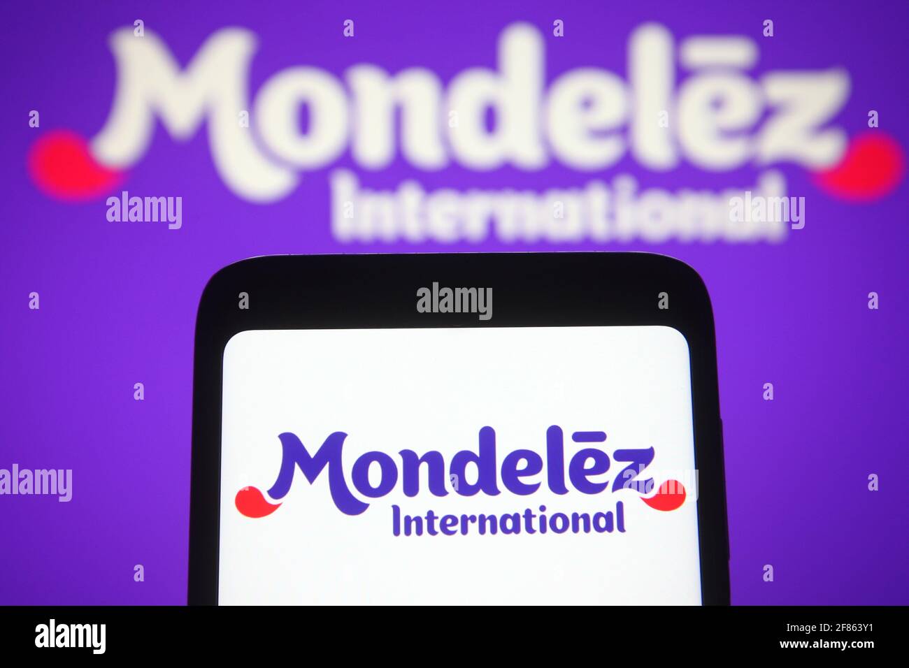 In this photo illustration the Mondelez International logo is seen on a ...