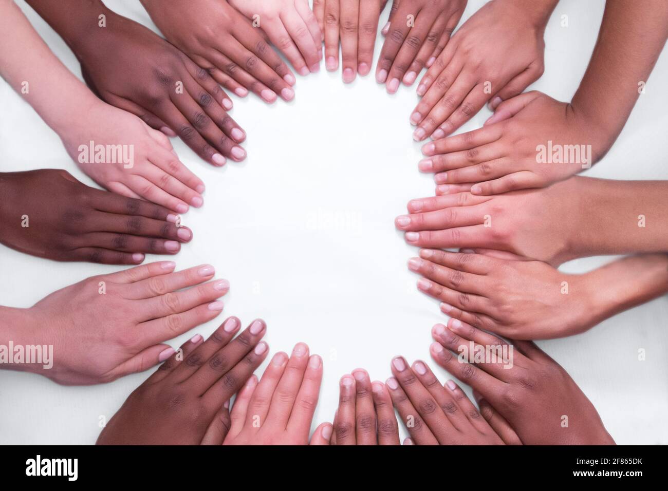 Multicultural hands on a white backdrop in a heart shape Stock Photo ...