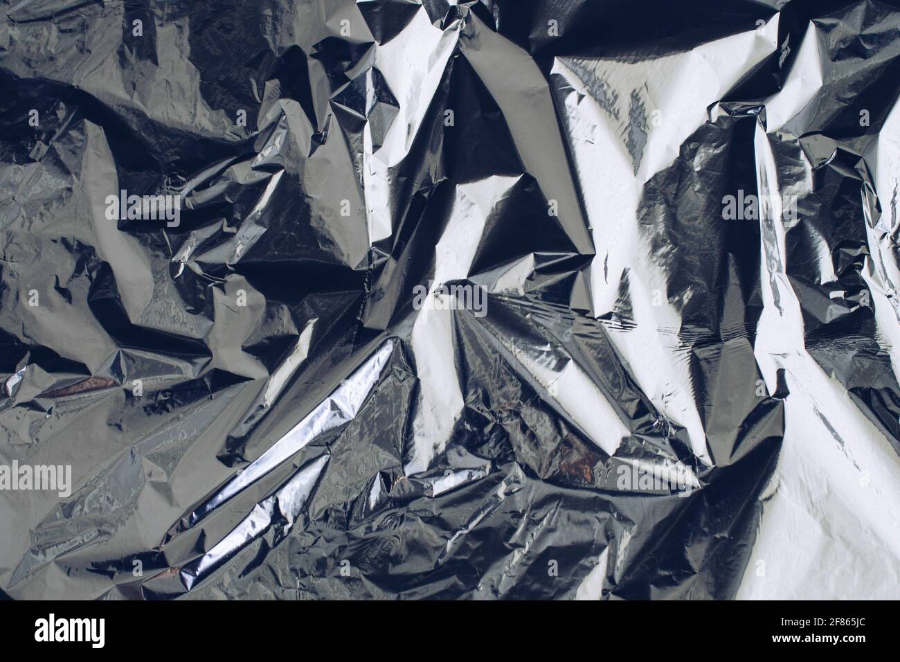 Crumpled foil texture. Crumpled paper is shiny with a color tint Stock ...