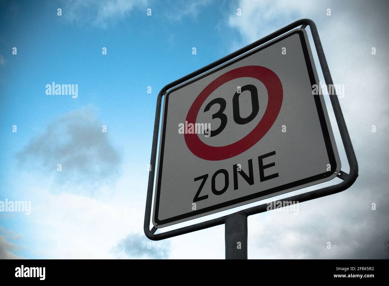 Low angle shot of a 30 speed limit sign Stock Photo - Alamy
