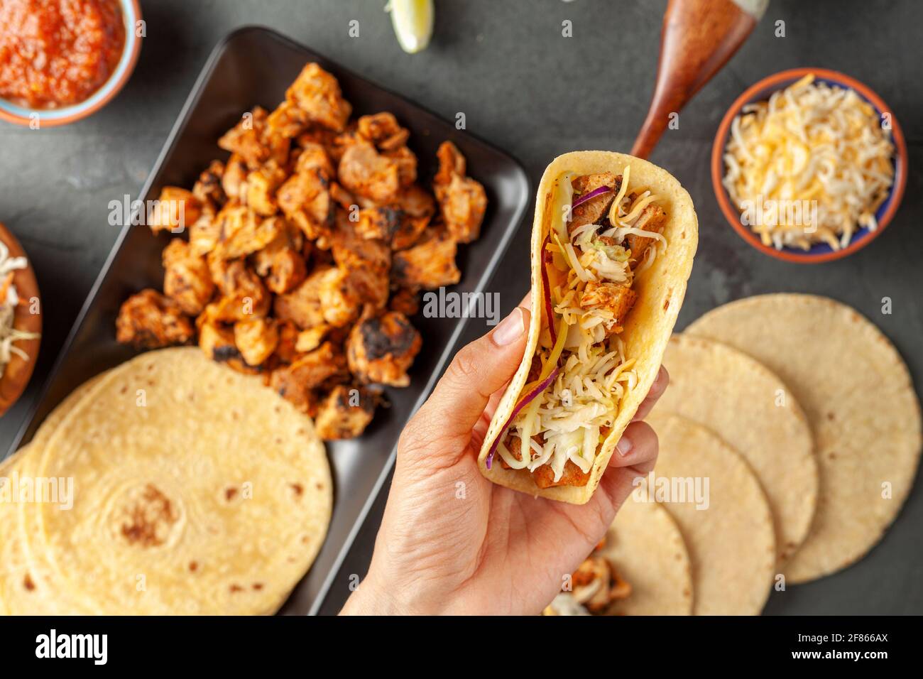 Hand holding mexican street food hi-res stock photography and images ...