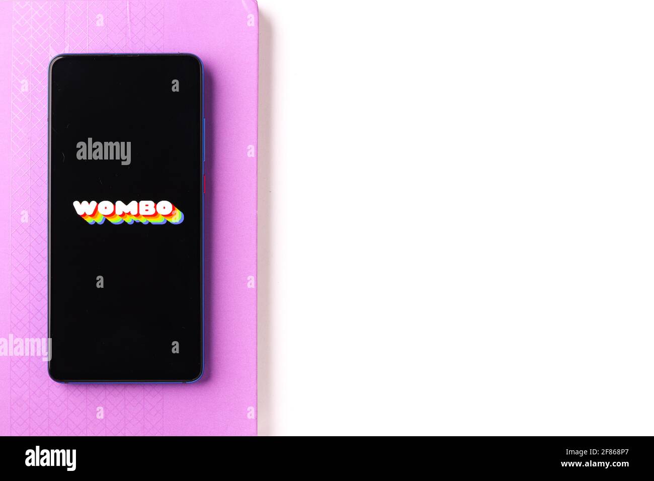 Assam, india - April 10, 2021 : Wombo ai logo on phone screen stock ...