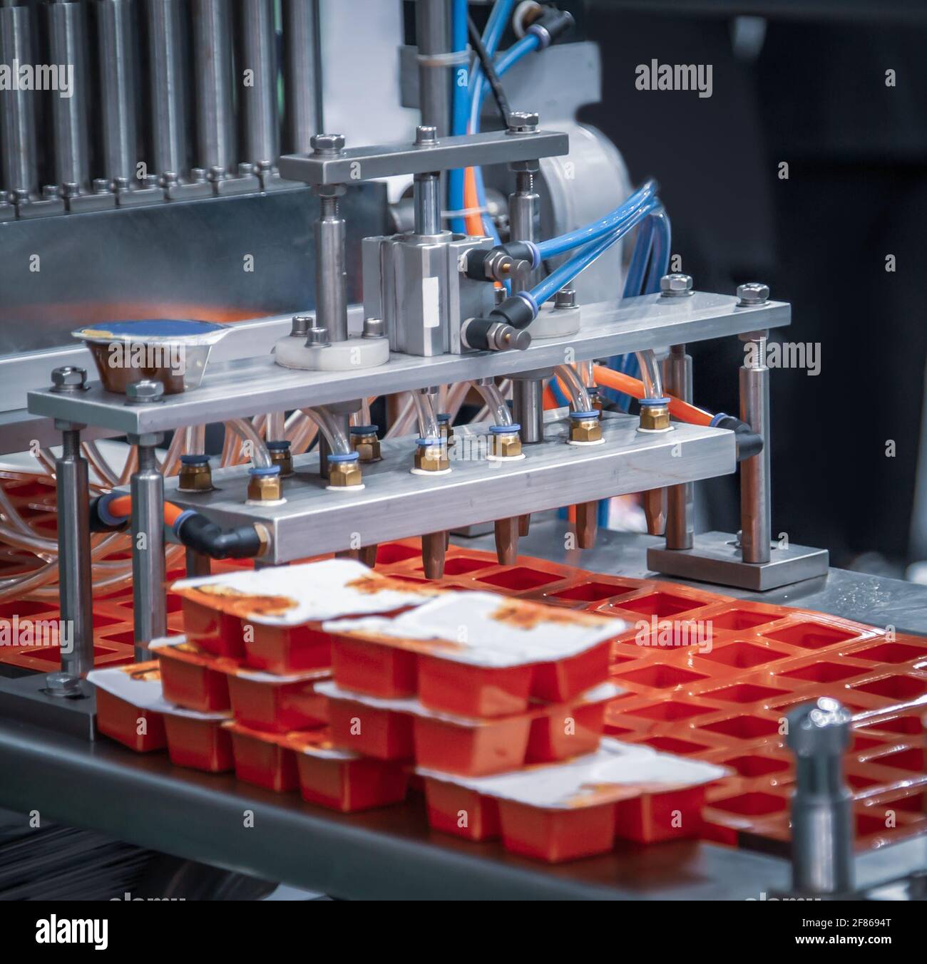 Process of automatic ketchup sauce cup filling and sealing machine ...