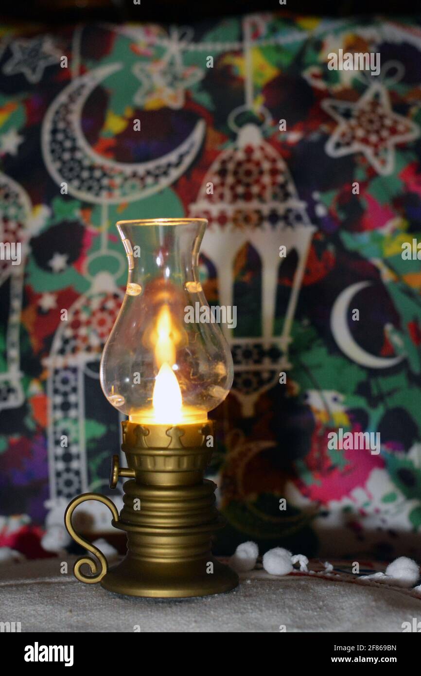 Ramadan lantern Fanoos Ramadan as an oil lamp with blurred background ...
