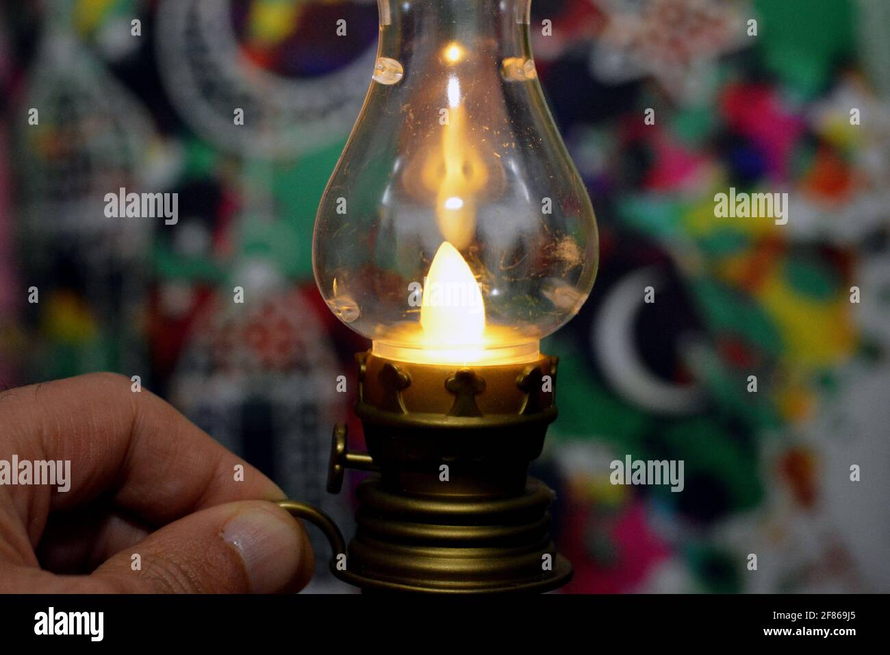 Ramadan lantern Fanoos Ramadan as an oil lamp with blurred background ...