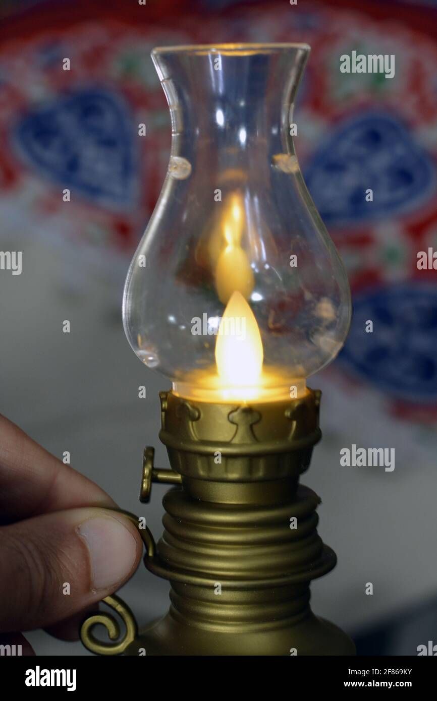 Ramadan lantern Fanoos Ramadan as an oil lamp with blurred background ...