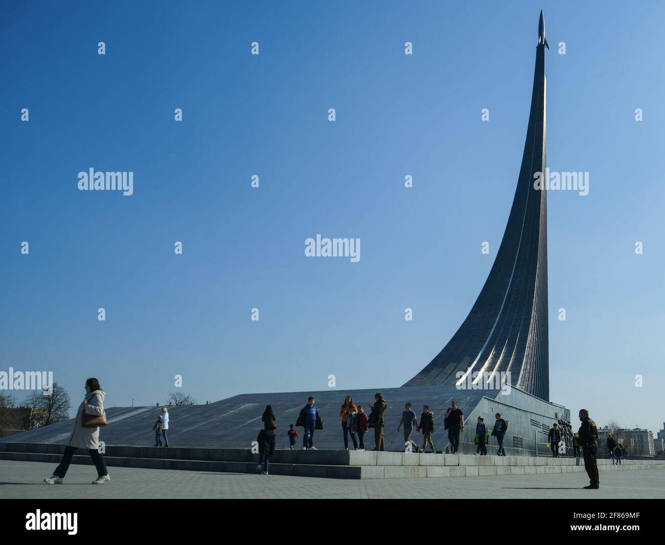 Visitors to the Museum of Cosmonautics seen at the foot of the Monument ...