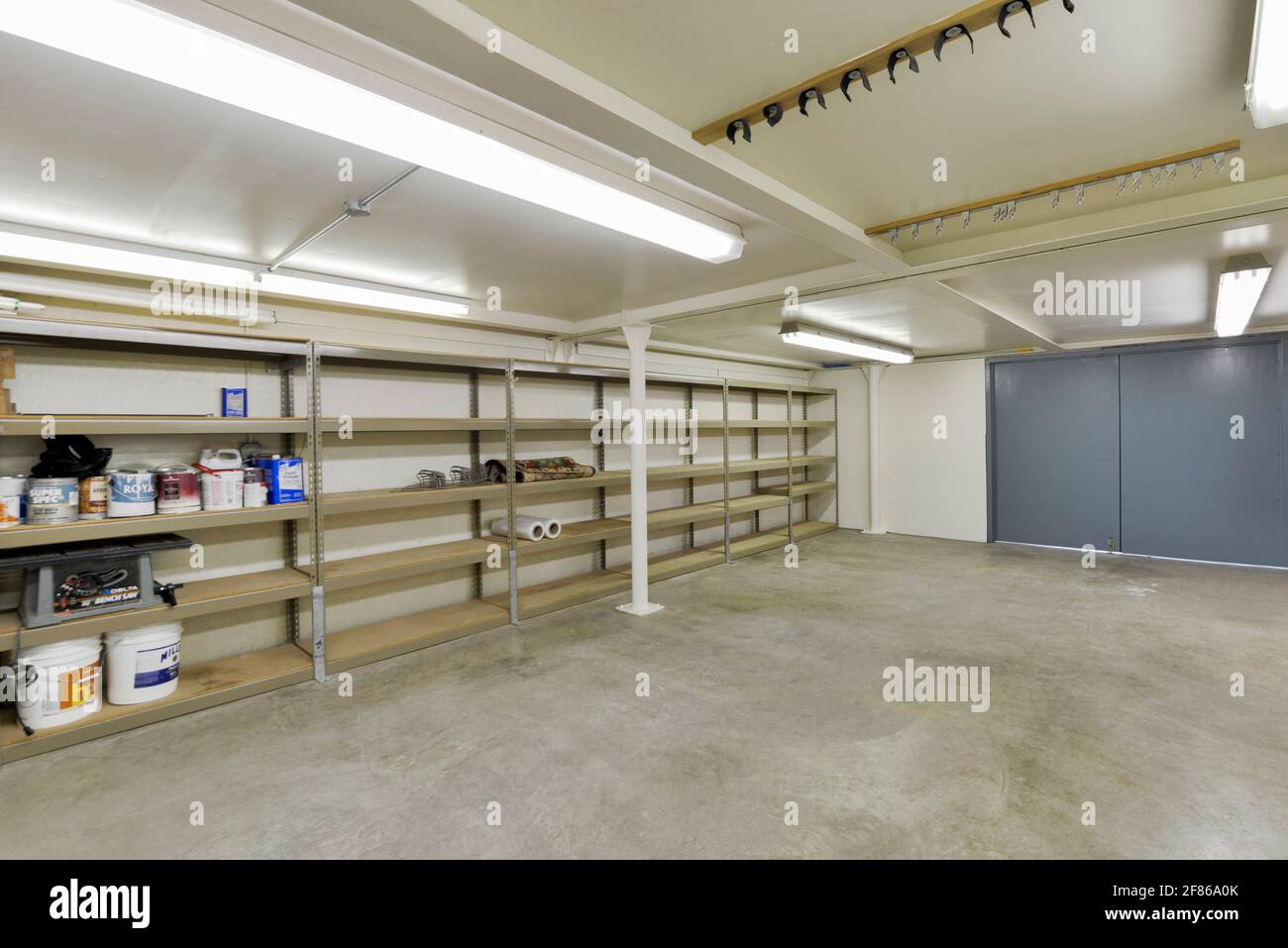Modern residential garage or basement interior Stock Photo - Alamy