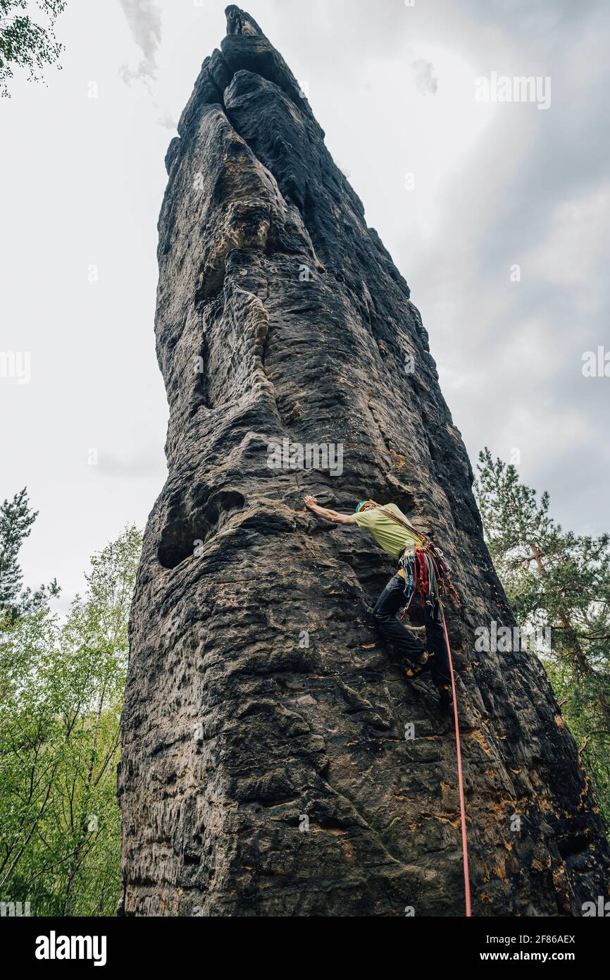 Rock climbing on sadnstone towers in Czechia Stock Photo - Alamy