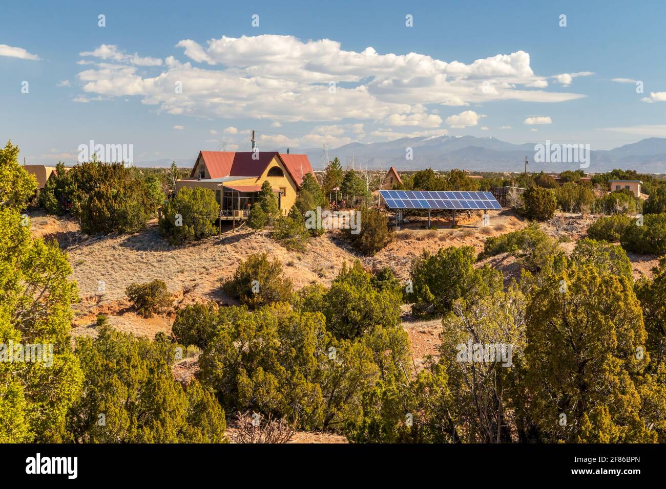 Scenic landscape with a house and solar panels on the Turquoise Trail ...