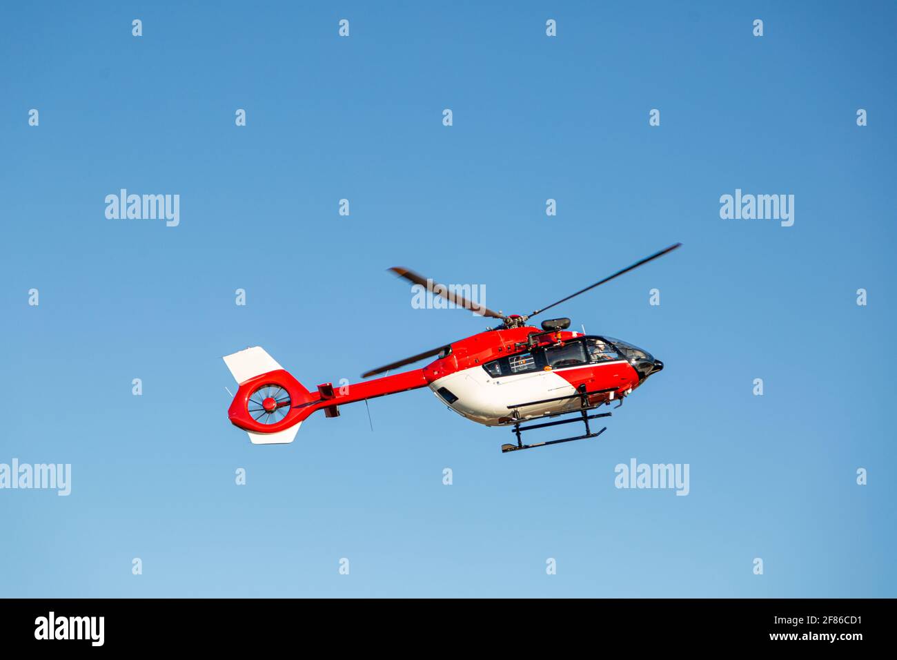 Fire fighter helicopter flying in the air Stock Photo - Alamy