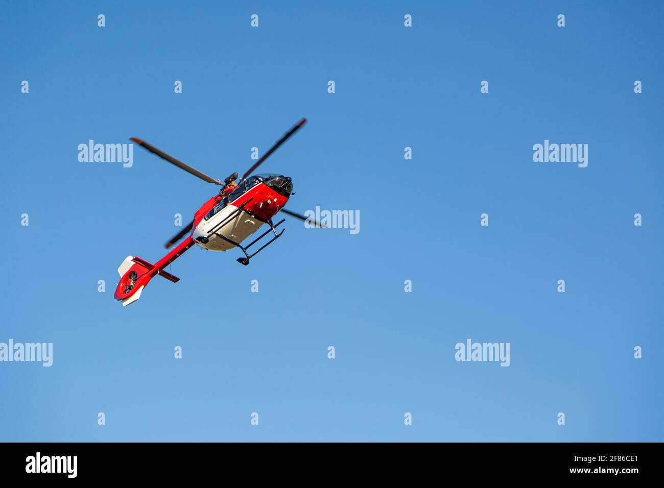 Fire fighter helicopter flying in the air Stock Photo - Alamy