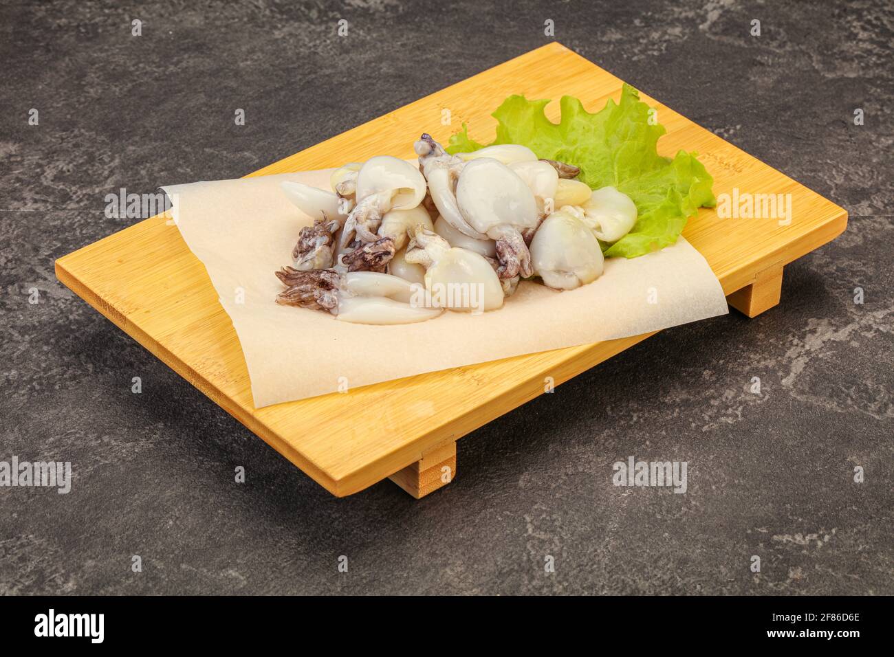 Raw seafood - cuttlefish for cooking over board Stock Photo - Alamy