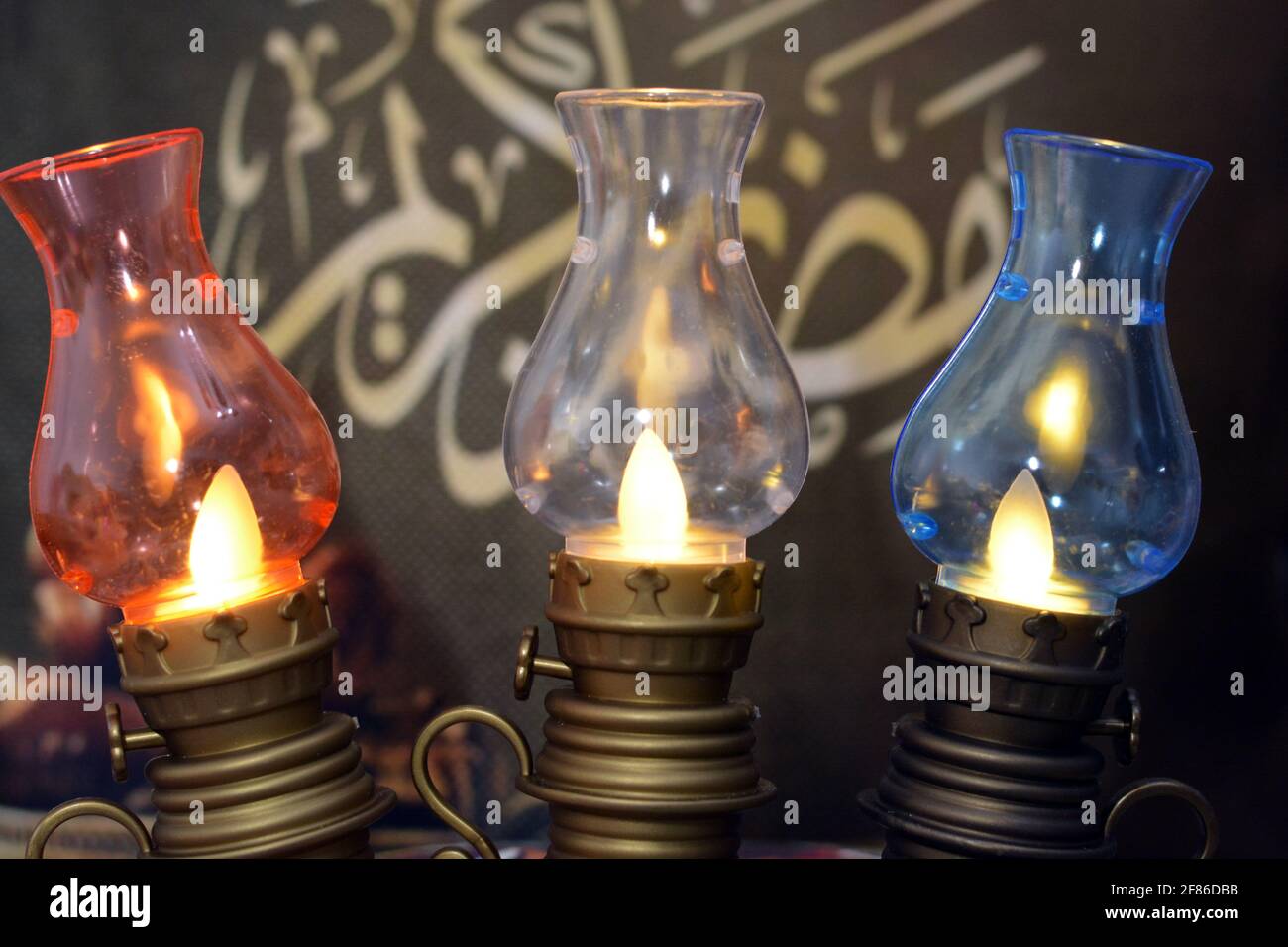 Ramadan lanterns Fanoos oil lamps with blurred background of Arabic ...