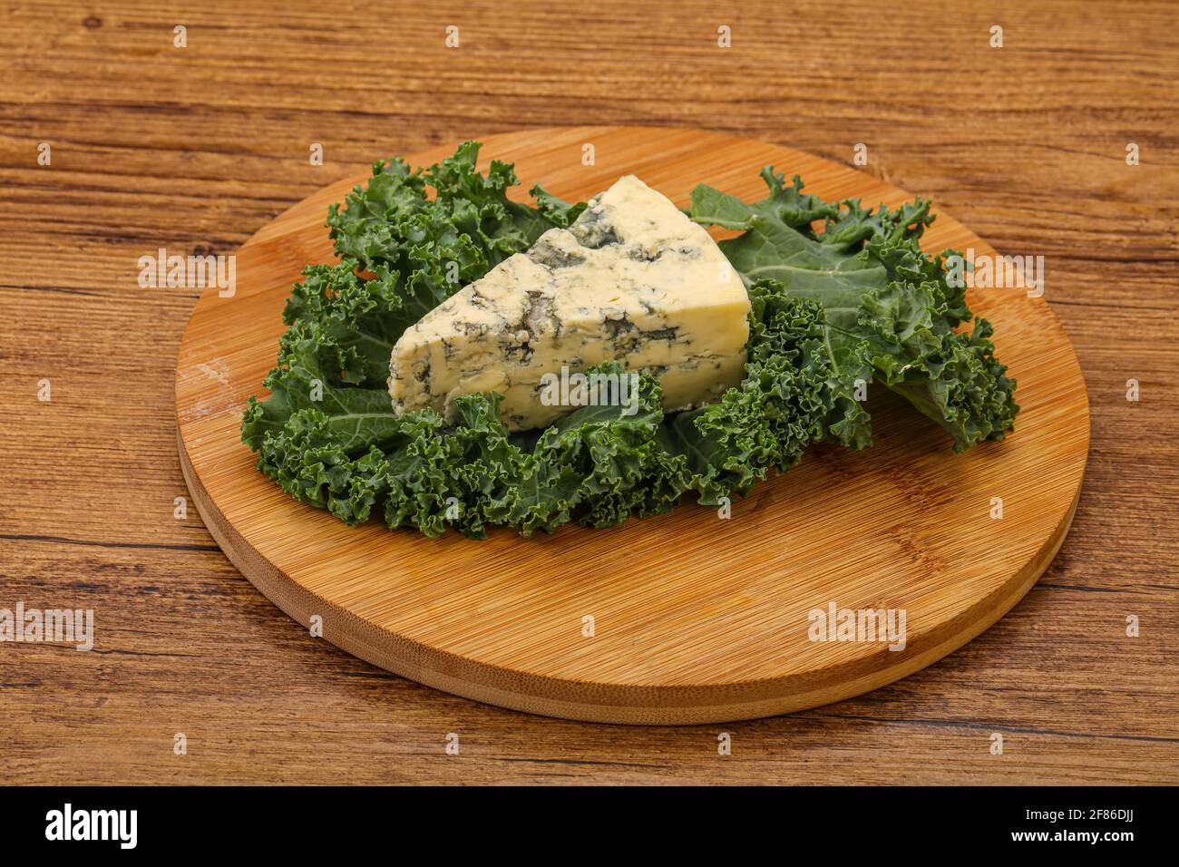 Dairy Blue cheese triangle with mold Stock Photo - Alamy