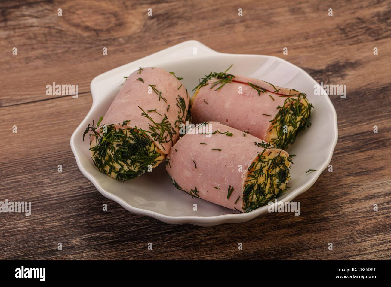 Ham roll snack with cheese and garlic Stock Photo - Alamy