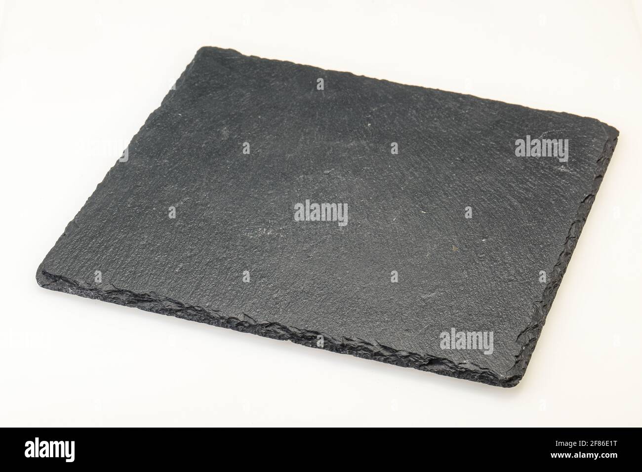 Black stone board for kitchen cutting Stock Photo - Alamy