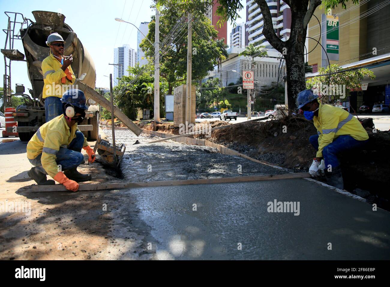 salvador, bahia, brazil - december 9, 2020: masons work on the ...