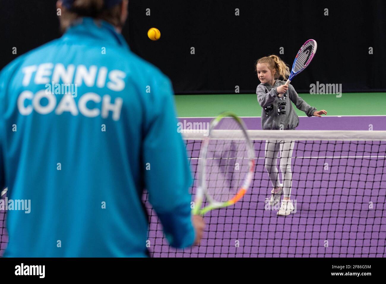 EDITORIAL USE ONLY Tennis coach James Hoad trains Elsa Coombes at David ...