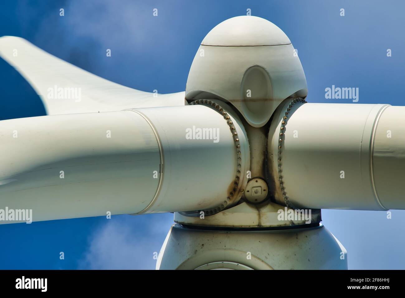 Macro shot of connection of blades to the cone of a wind generator ...