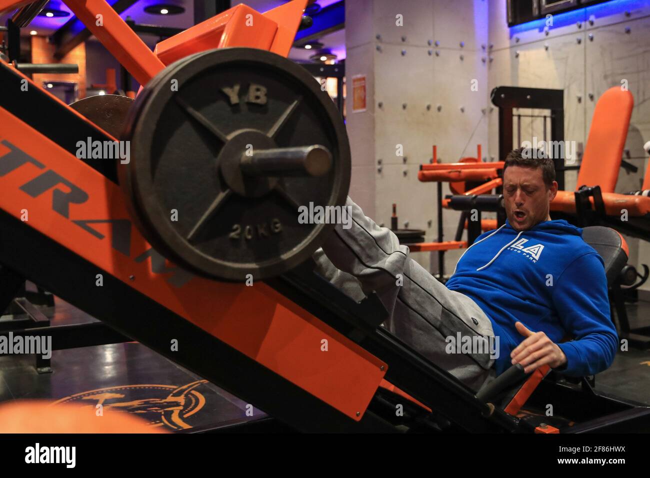 Barnsley, UK. 12th Apr, 2021. A gym enthusiast works out in the gym for ...