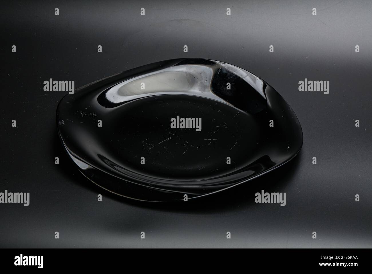 Empty color plate for kitchen isolated Stock Photo - Alamy