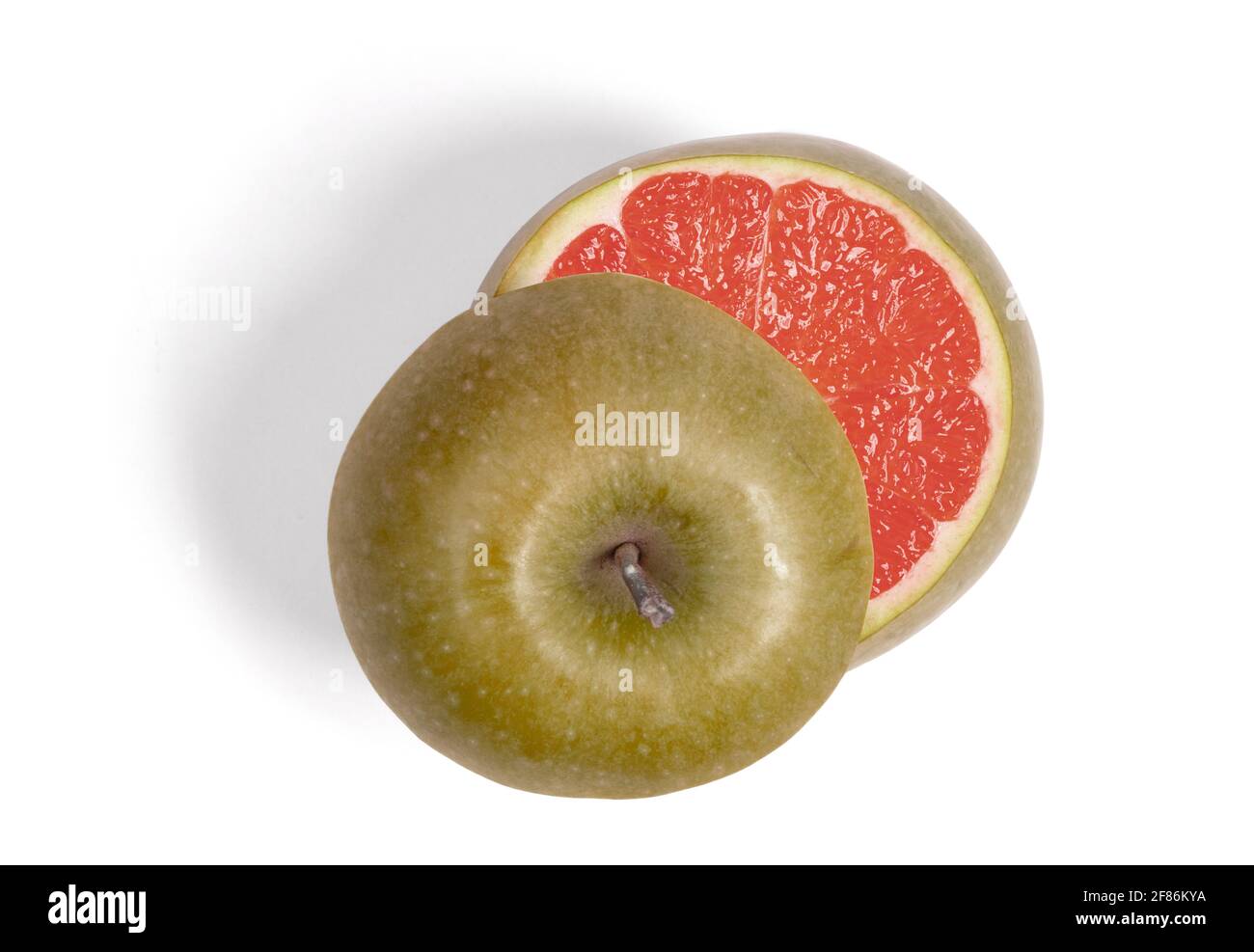 Green apple with grapefruit inside, isolated on white Stock Photo - Alamy