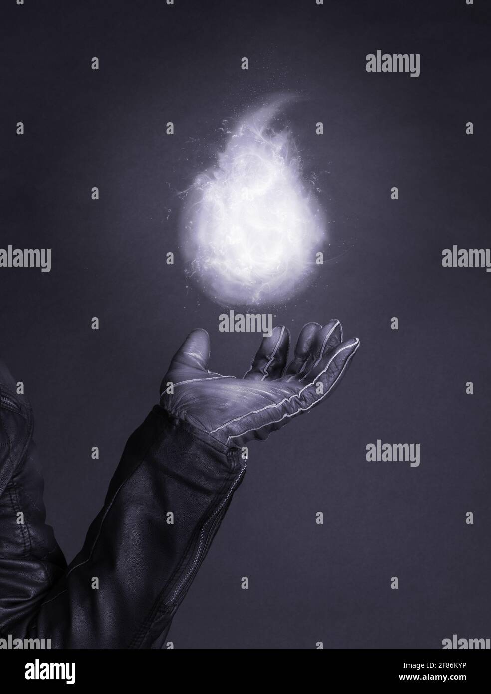 Levitating magic fire flame on a special glove - Concept of magic Stock ...