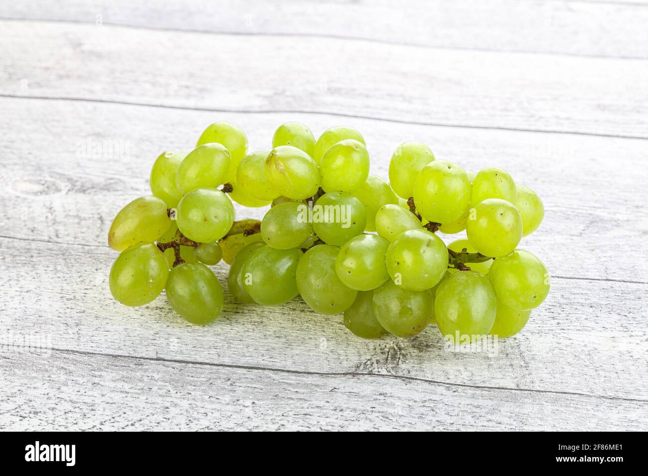 Ripe sweet green grape branch isolated Stock Photo - Alamy