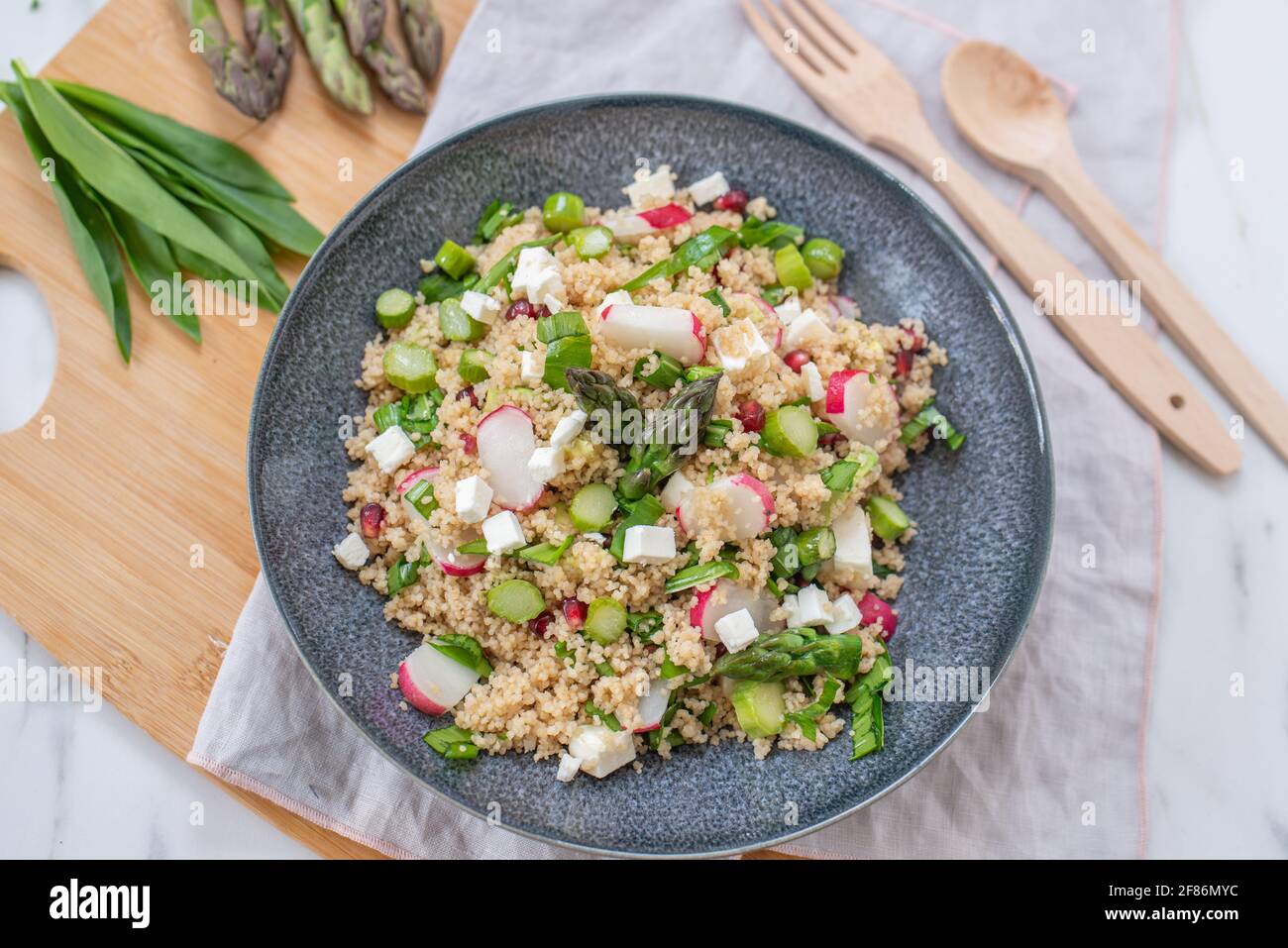 healthy spring couscous salad with asparagus and herbs Stock Photo - Alamy