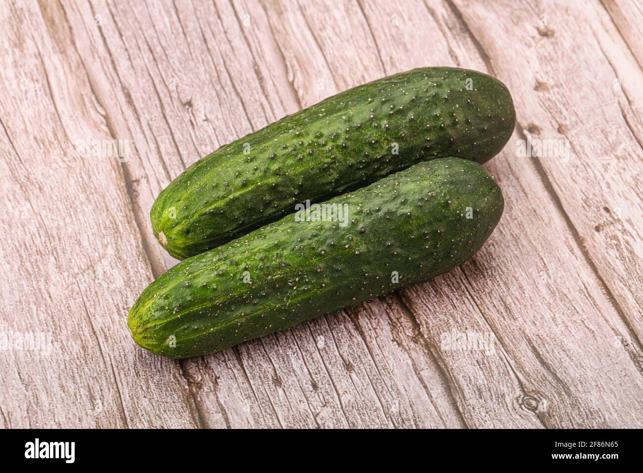 Ripe organic natural green cucumber isolated Stock Photo - Alamy