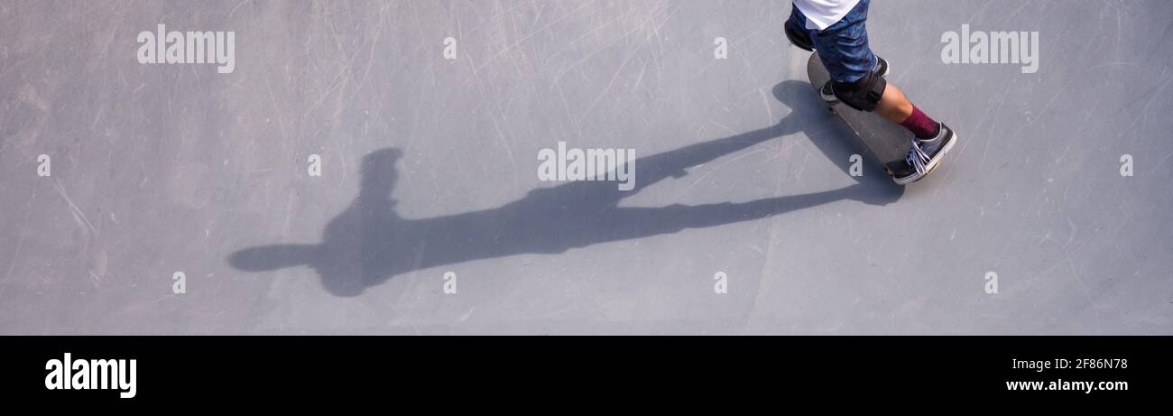 Man tricks on skateboard in hi-res stock photography and images - Alamy