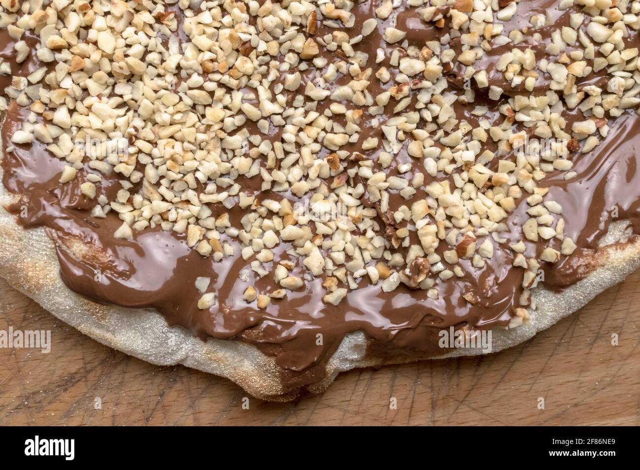 Nutella pizza with hazelnut. Original, fresh, new Stock Photo - Alamy