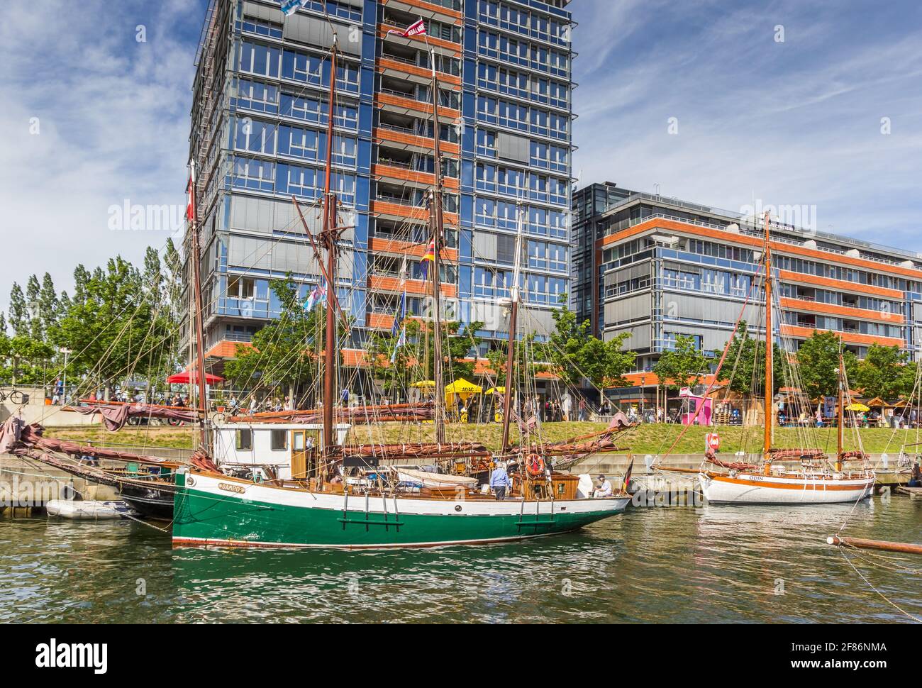 Old ships and modern buildings in the harbor of Kiel, Germany Stock ...