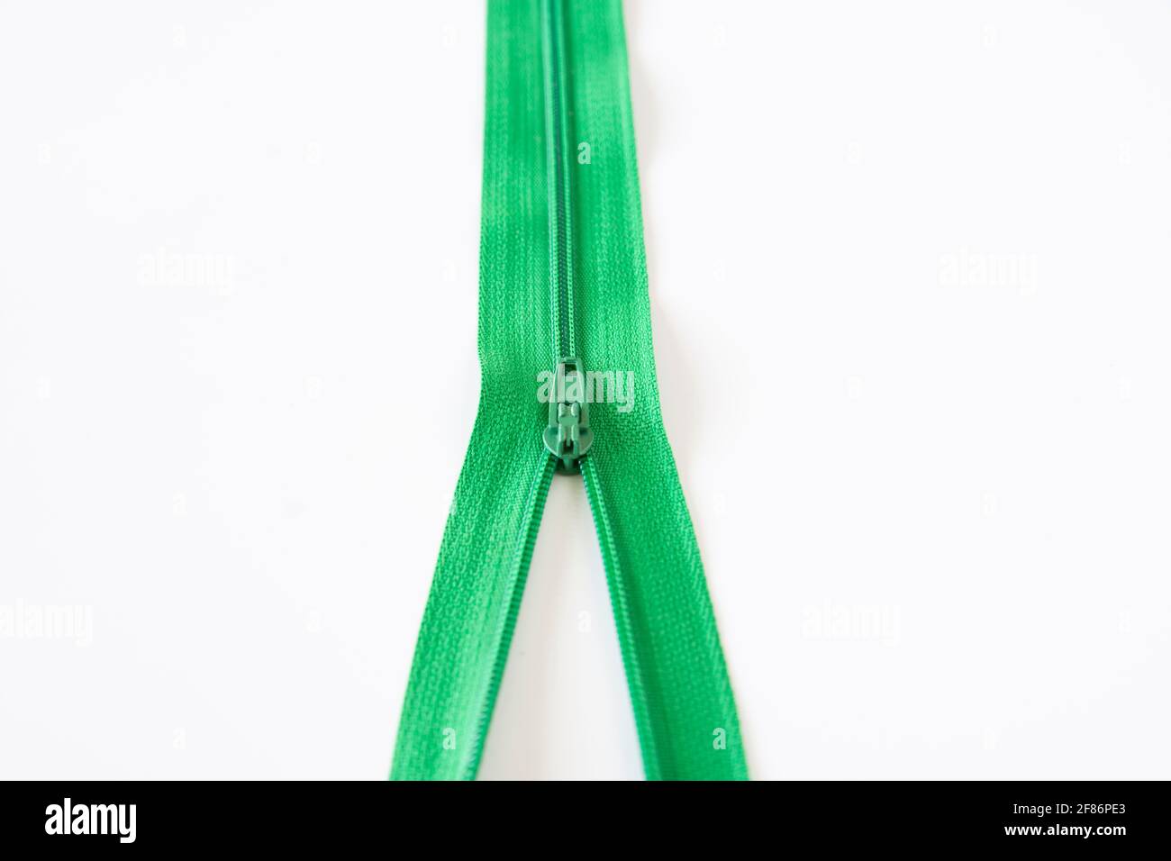 Zipper puller hi-res stock photography and images - Alamy