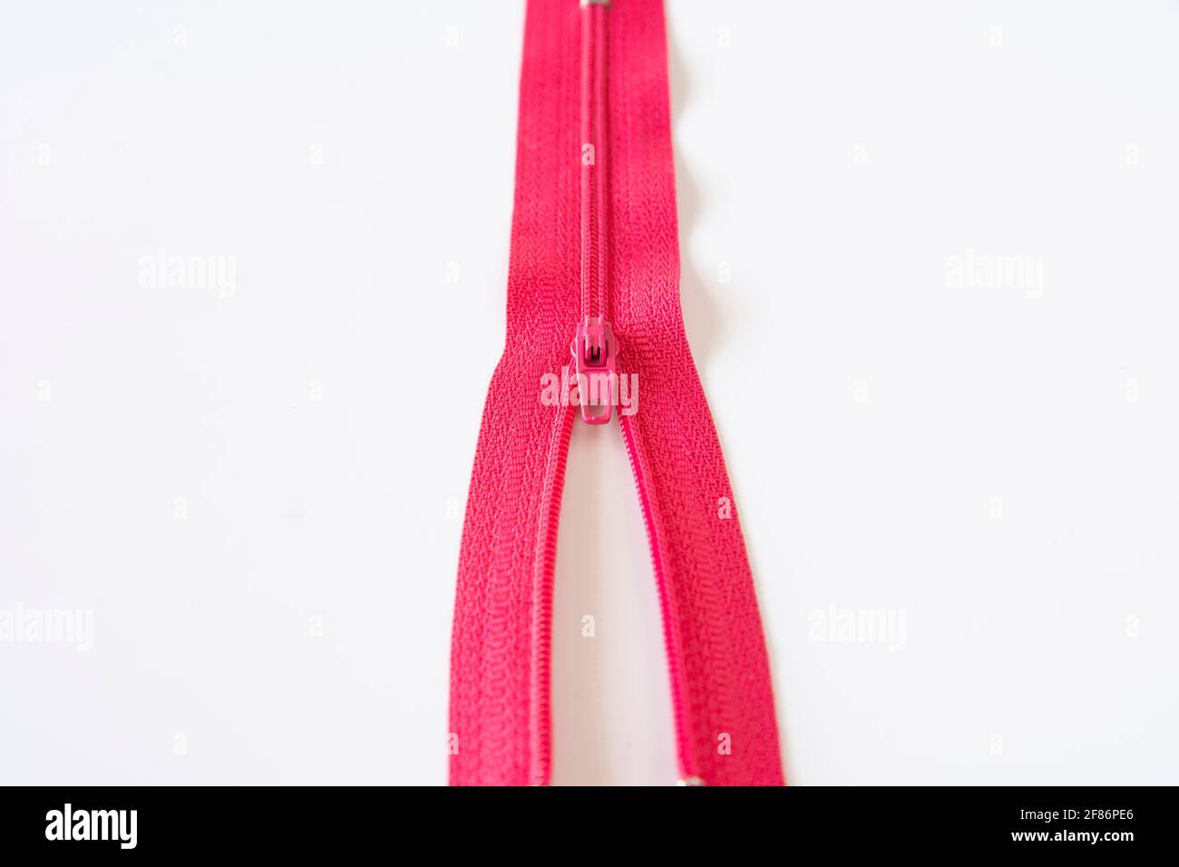 Zipper puller hi-res stock photography and images - Alamy